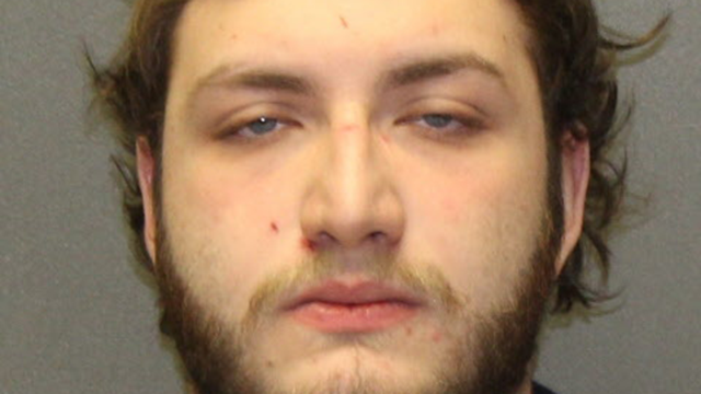 Bank teller arrested in connection with home invasion