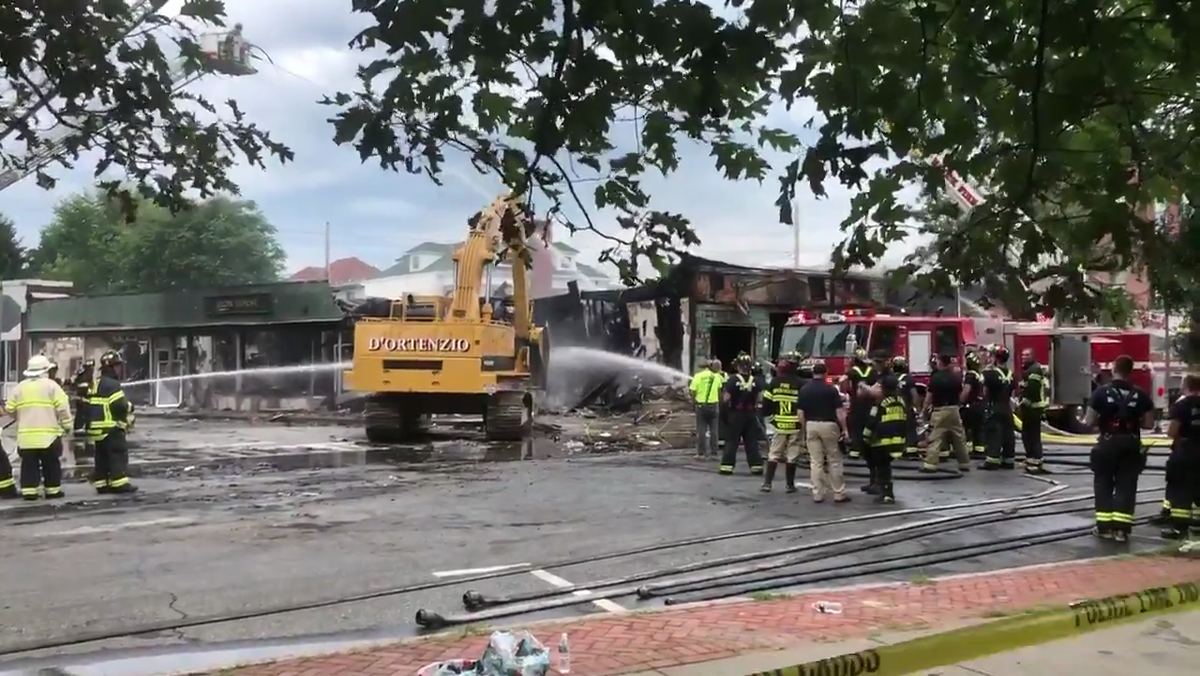 Crews demolish remains of building burned in 8-alarm Natick fire