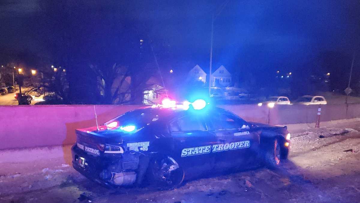 Vehicle hits NSP cruiser as trooper stopped to help drivers on highway