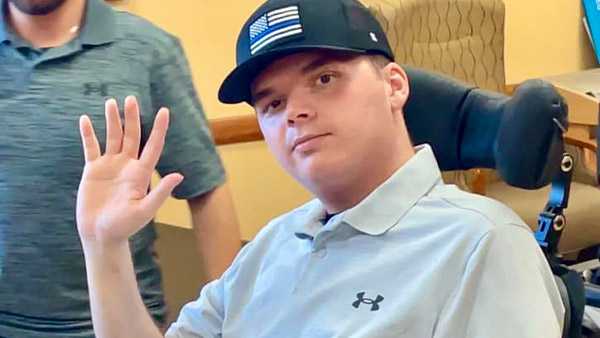 LMPD Officer Nick Wilt being honored at Light Up La Grange