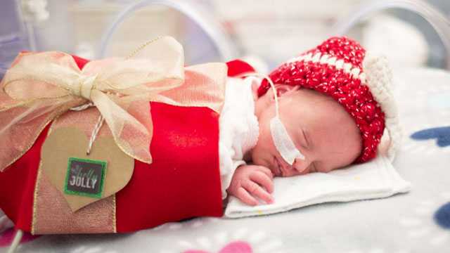 Hospital dresses NICU babies for photos with Santa