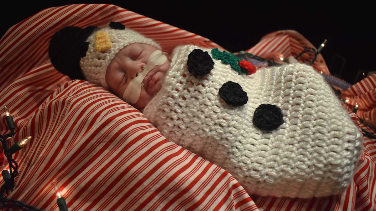 NICU babies dressed in Christmas outfits at UofL Hospital