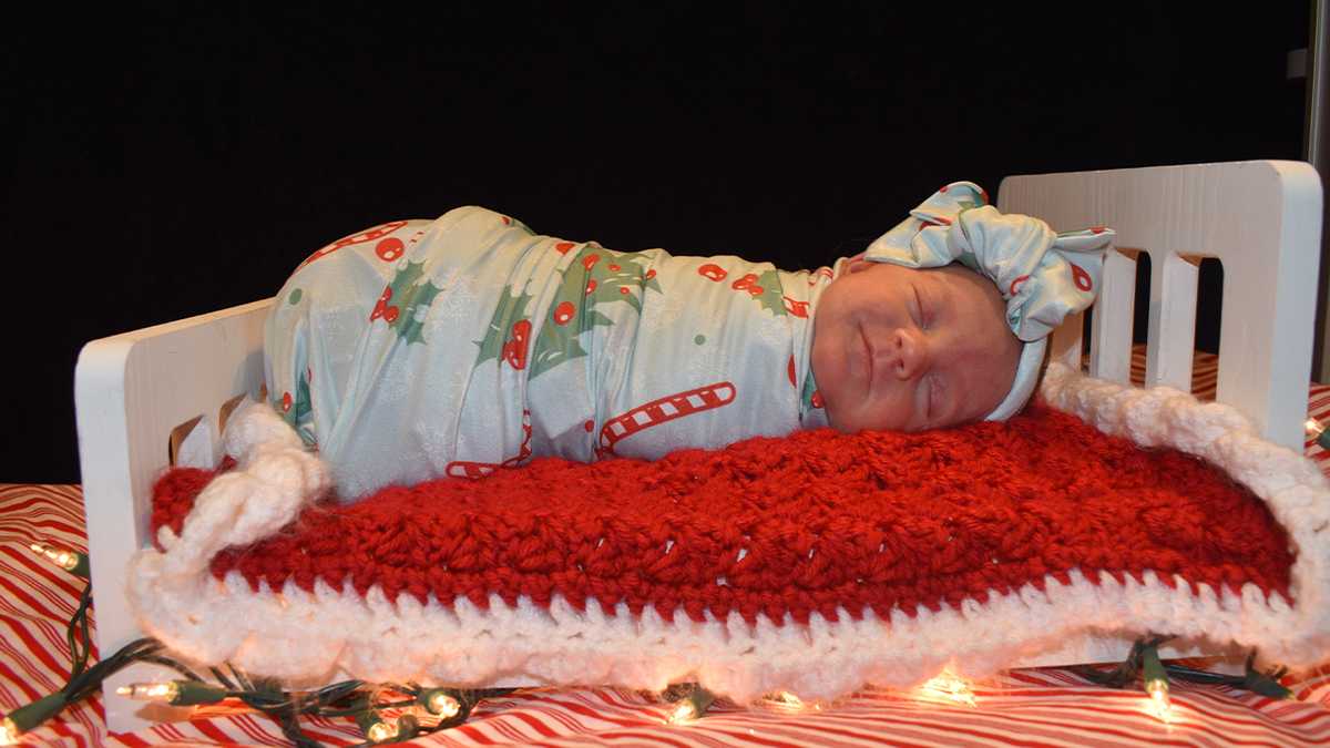 NICU babies dressed in Christmas outfits at UofL Hospital