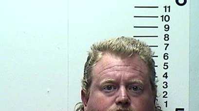 Husband charged in wife's death extradited