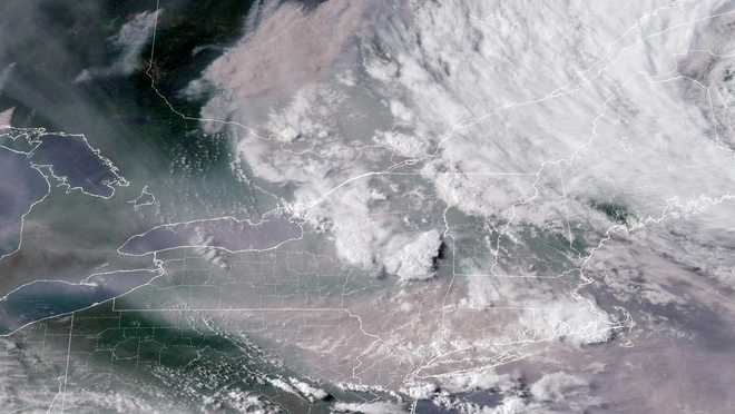 How long will wildfire haze persist in Massachusetts skies?