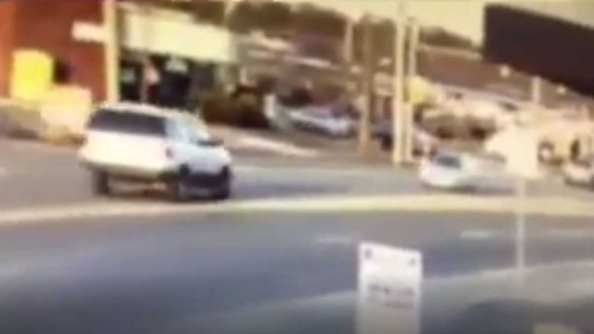 Camera captures SUV move into oncoming traffic, slam into car