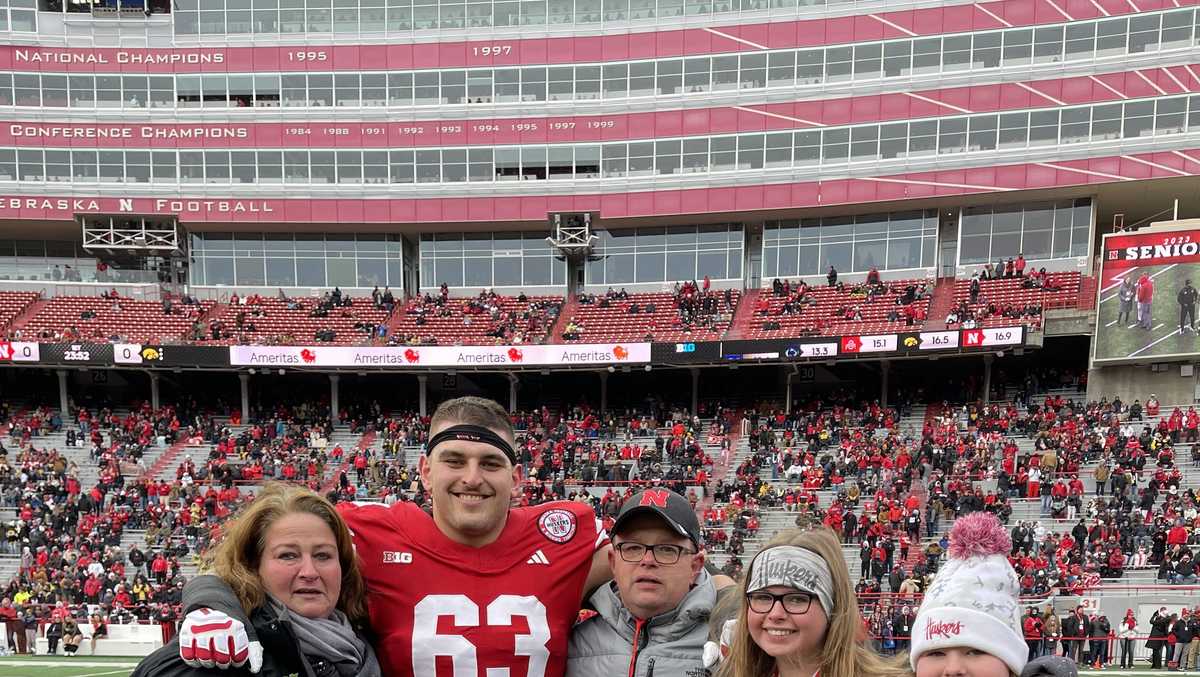 Nebraska senior surprises stepdad during heartwarming moment