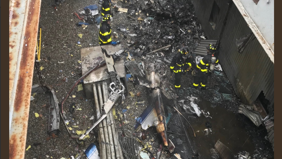 Pilot killed after helicopter crashes onto roof of NYC skyscraper
