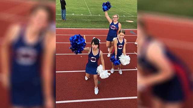 'Acts of love and inclusion': Girl with Down syndrome cheers at her ...