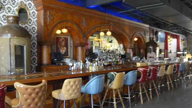 Find the hidden button in this new OTR bar and get free booze