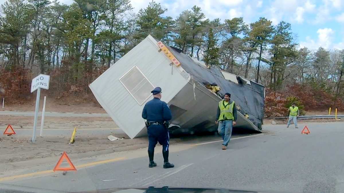 Office trailer being towed falls onto Massachusetts highway