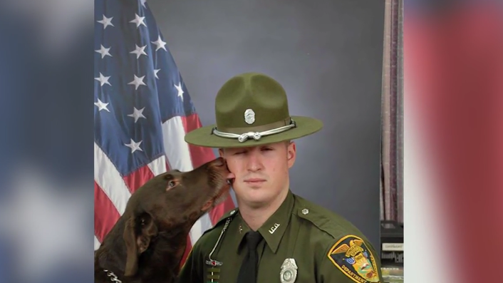 WATCH: Police officer's adorable photo outtakes with K-9 partner wins ...