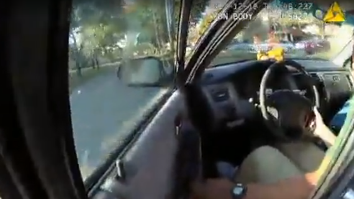 Body Cam Footage Shows Officer Being Dragged By Suspects Car