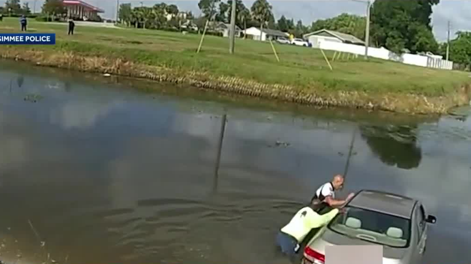 Kissimmee police officer saves woman trapped in sinking car