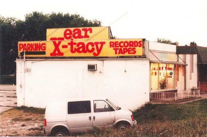 Iconic Ear X-tacy sign finds permanent home in Frazier Museum