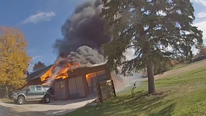 VIDEO: First responders rescue Ohio woman trapped in burning home