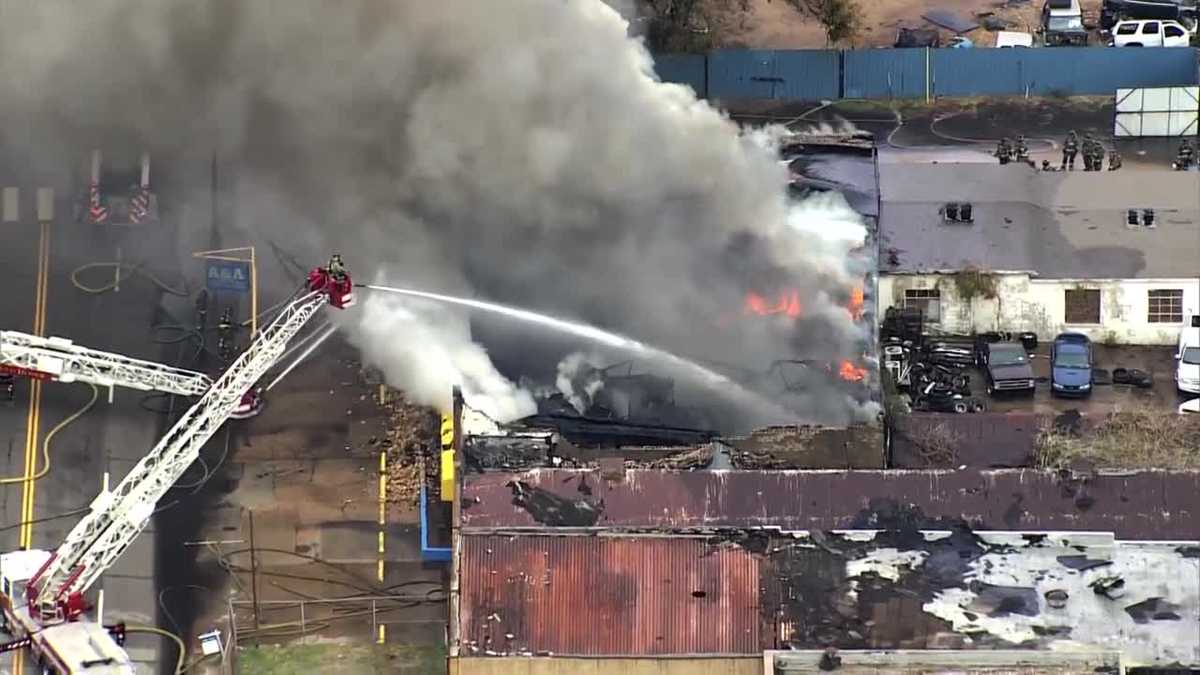 Oklahoma City crews shut down road while battling fire