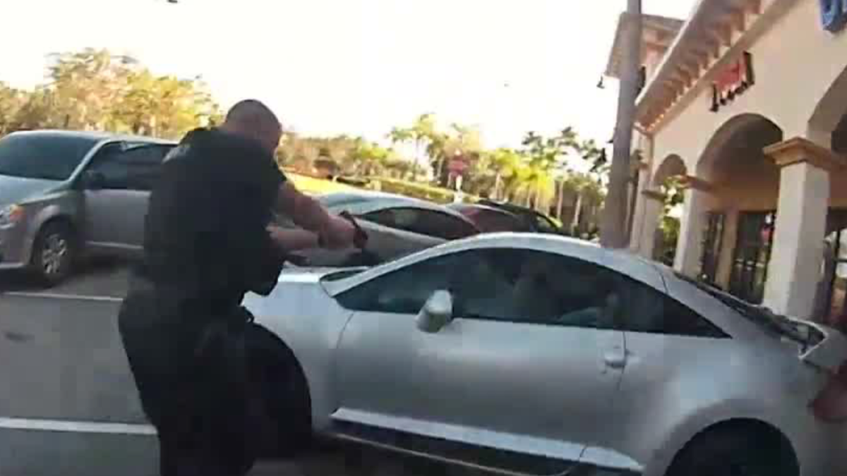 Body camera video shows Orlando police firing at fleeing vehicle