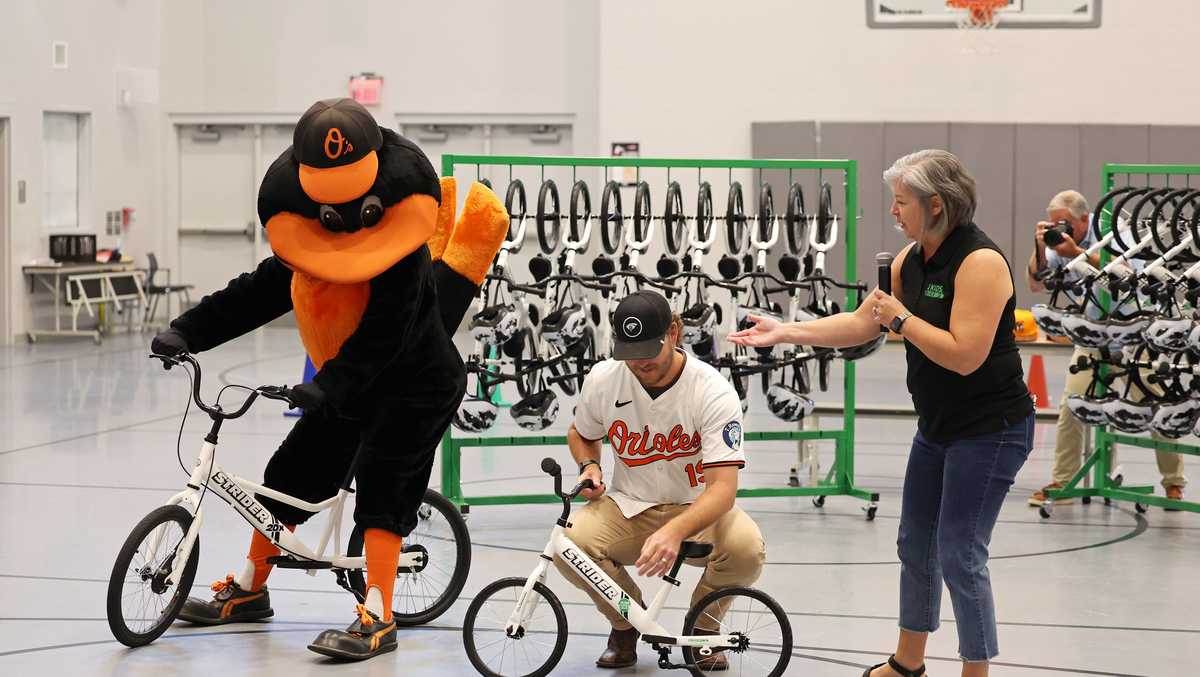 O's pitcher, wife donate bikes to another Baltimore school
