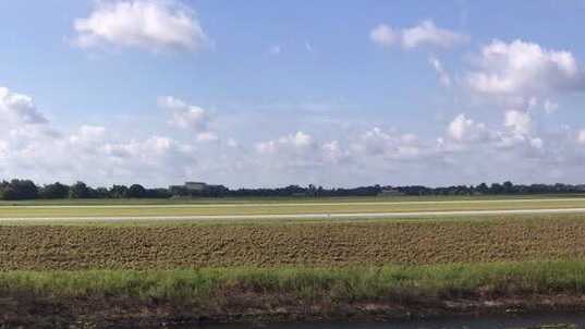 Plane veers off of runway into pond