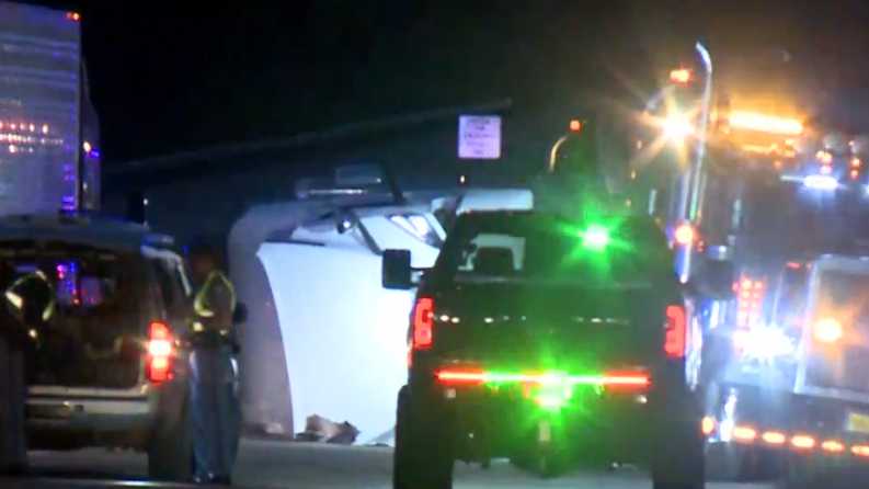 Tractor-trailer overturns on I-20 backing up traffic for miles