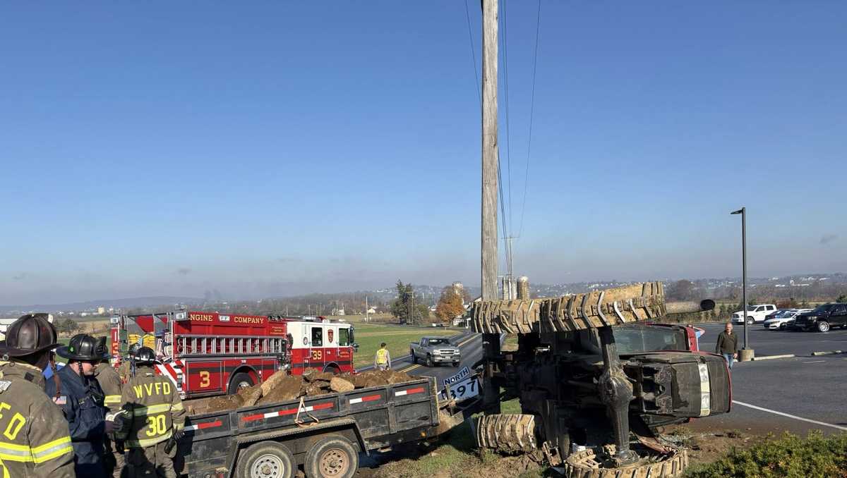 Farm tractor hauling stones overturns, hits utility pole in Lancaster ...