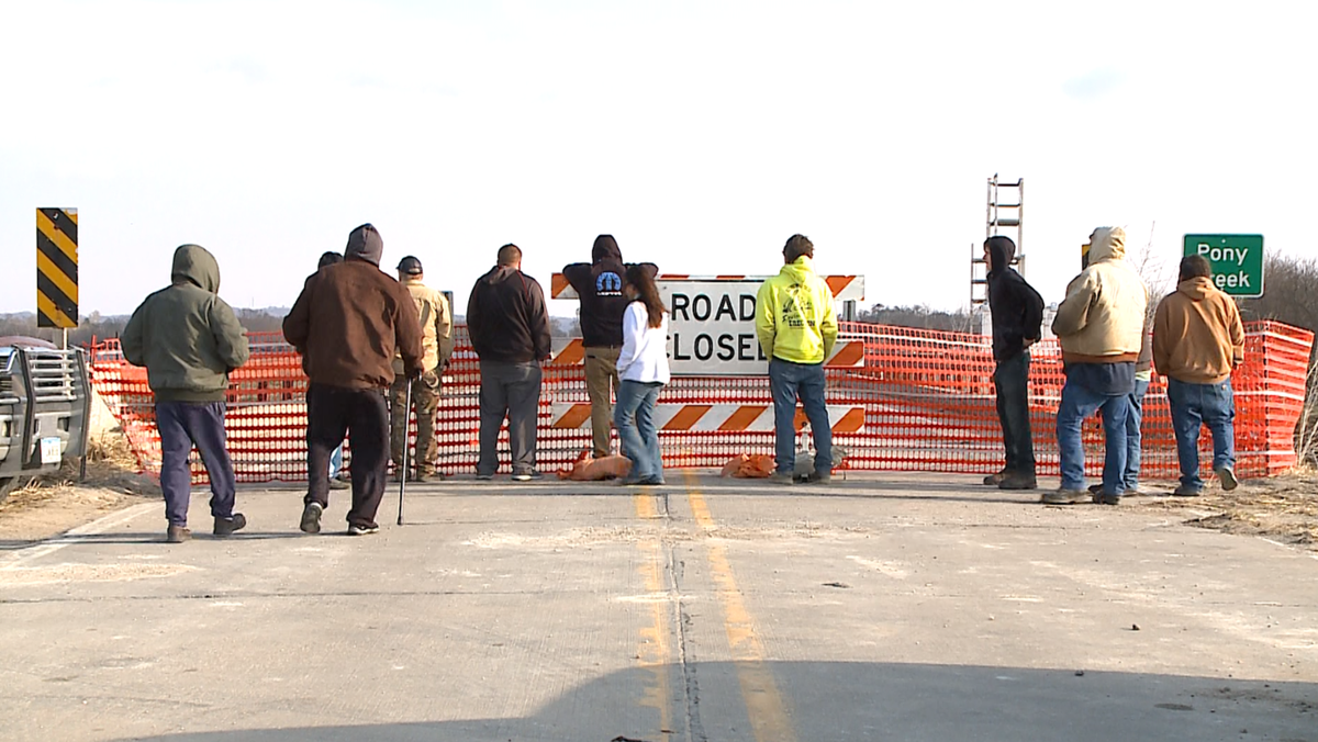 Frustrated Pacific Junction residents want back into flooded town
