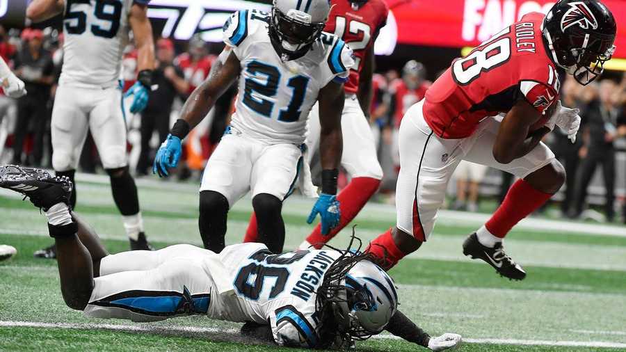 Ryan shines with arm and legs, Falcons beat Panthers 31-24