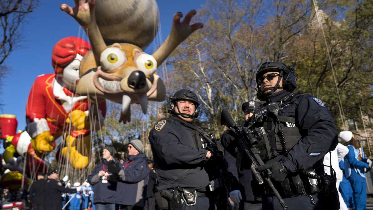 Macy’s parade rolls on with balloons, bands, security