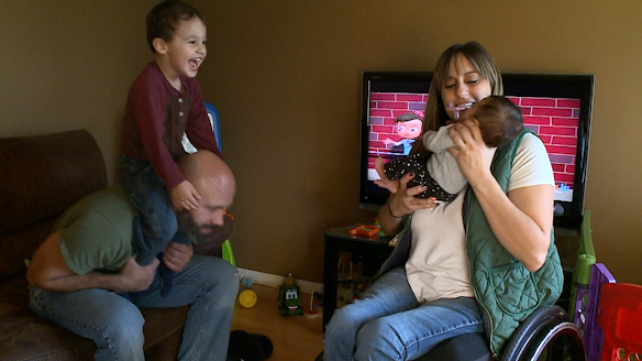 Four years later, paralyzed bride that walked down aisle is mom of two