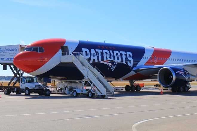 Flying in style! New England Patriots show off customized Boeing 767