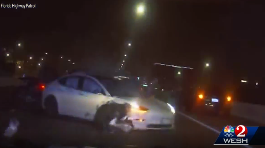 Terrifying dashcam video shows Tesla slam into trooper's cruiser on I-4