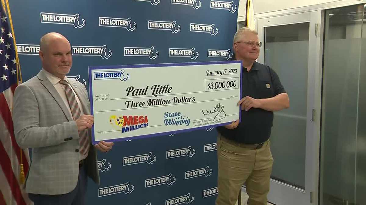 Lottery winner receives check for ticket at center of criminal case