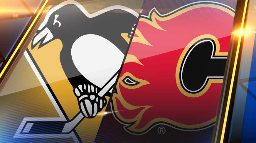 Flames beat Penguins in 7-round shootout