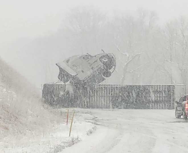 Tractor-trailer hauling ice cream overturns, popping cab off ground in ...