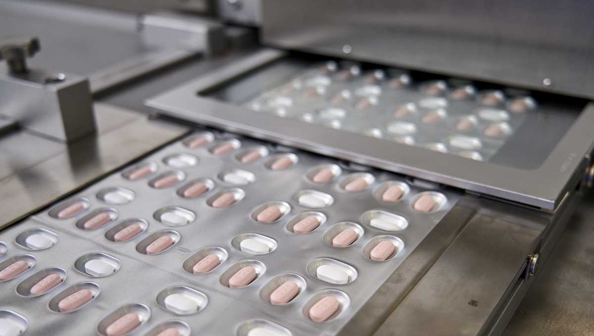 US approves first at-home COVID-19 drug, a Pfizer pill that aims to ...