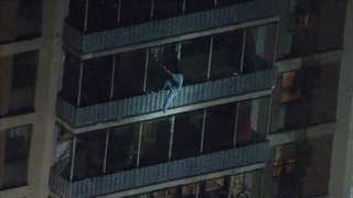 WATCH: Man escapes high-rise fire by climbing down it in true 'Spider ...