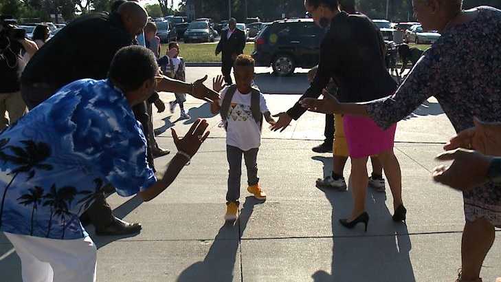 Fathers welcome students back to school for national Million Father March