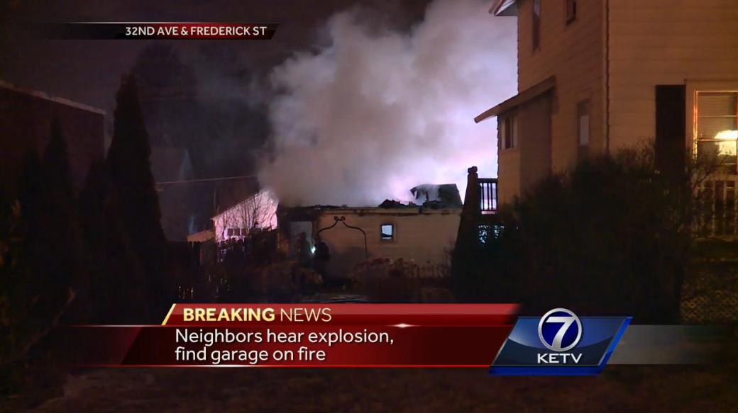 Neighbors hear explosion, find garage on fire