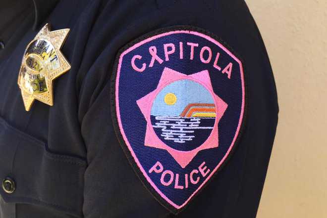 Capitola police officers' badges turn pink