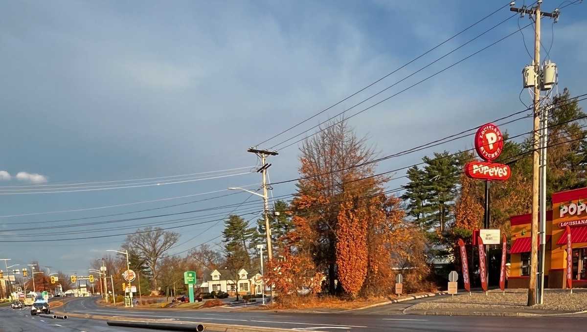 Pipes the size of utility poles fall onto road in Manchester