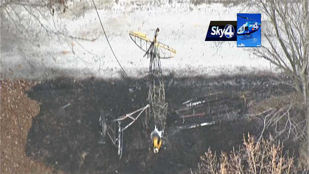 Fire destroys small plane after it hits wires, crashes