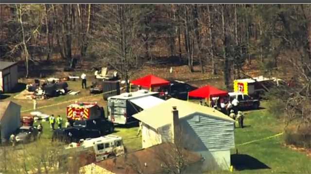 Military: Pilot ditched plane in woods to miss nearby homes