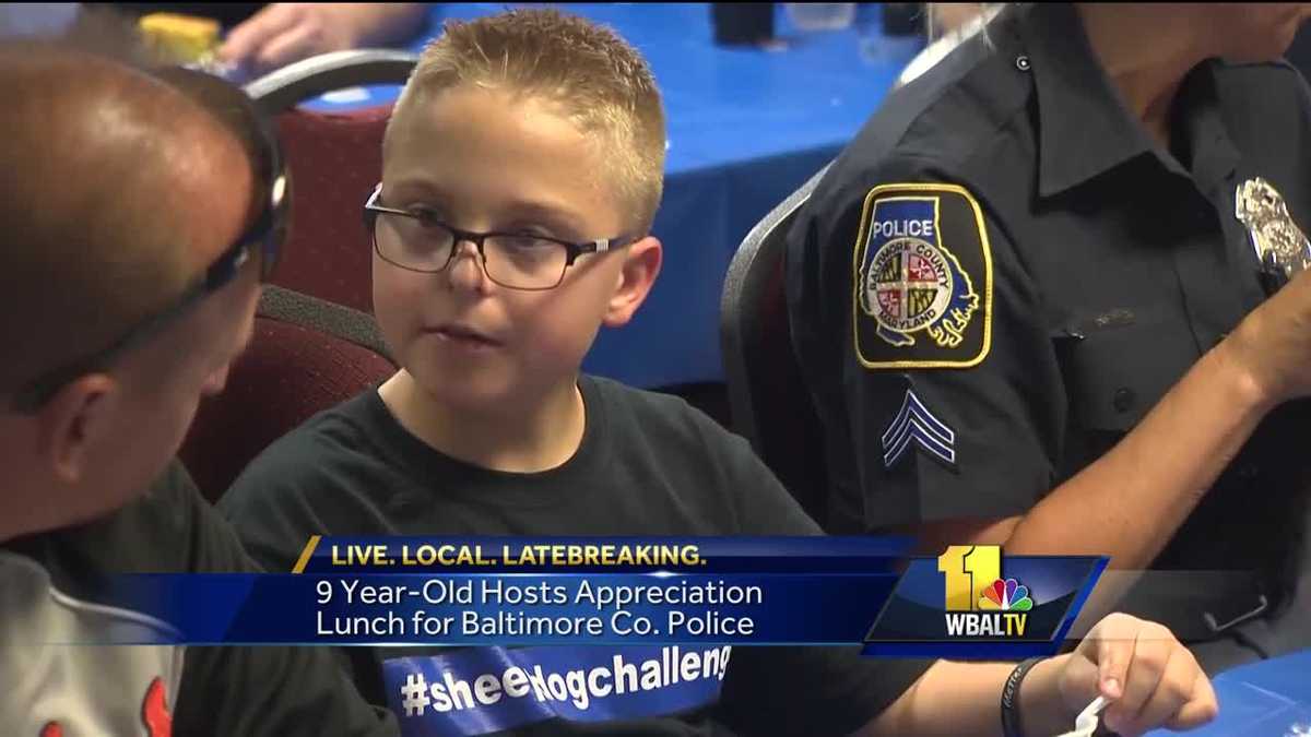Boy celebrating birthday treats police officers to lunch