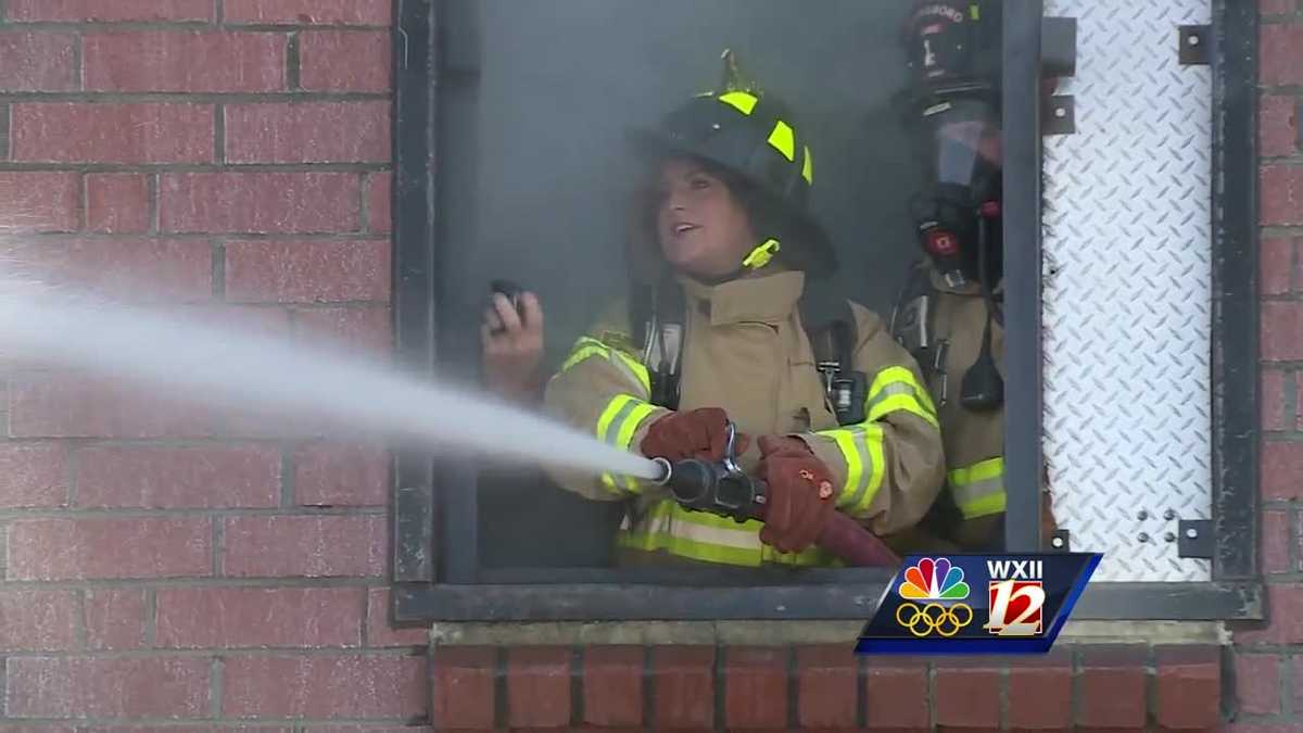WXII 12 reporter Bethany Moore tests her skills as a firefighter