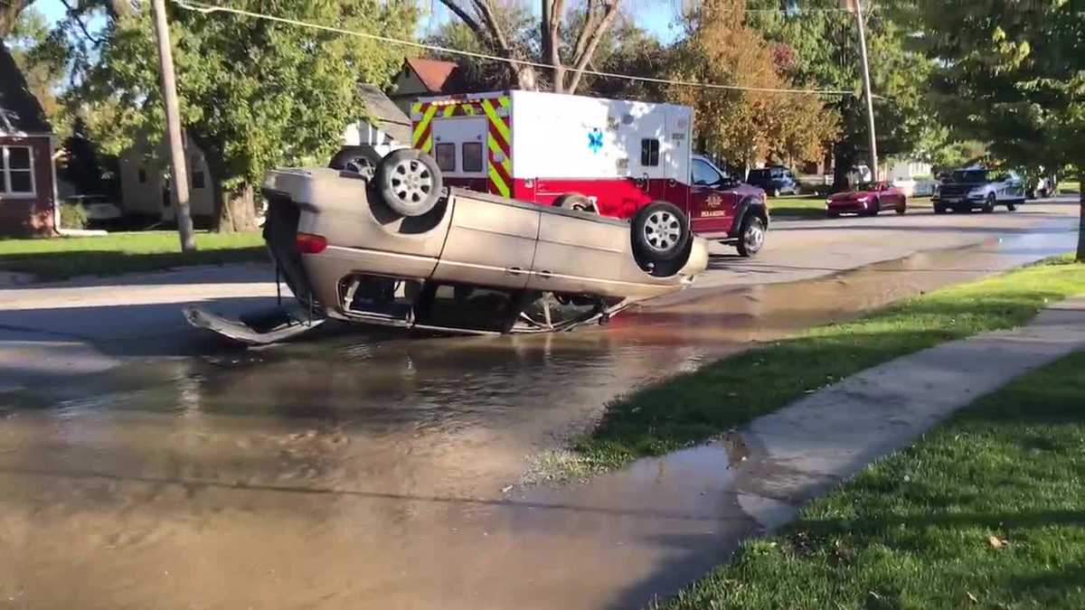 Police Womans Car Rolls Over After Hitting Fire Hydrant