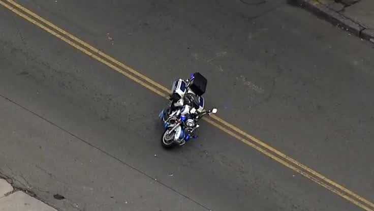 Motorcycle officer struck by vehicle, police say