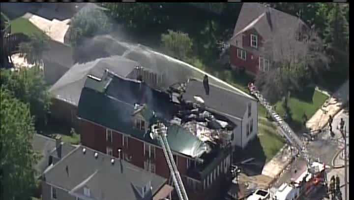 Firefighters battle house fire in Burlington