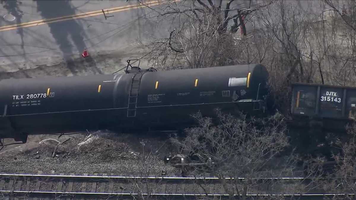 Photos: Freight train derails on bridge in north Baltimore