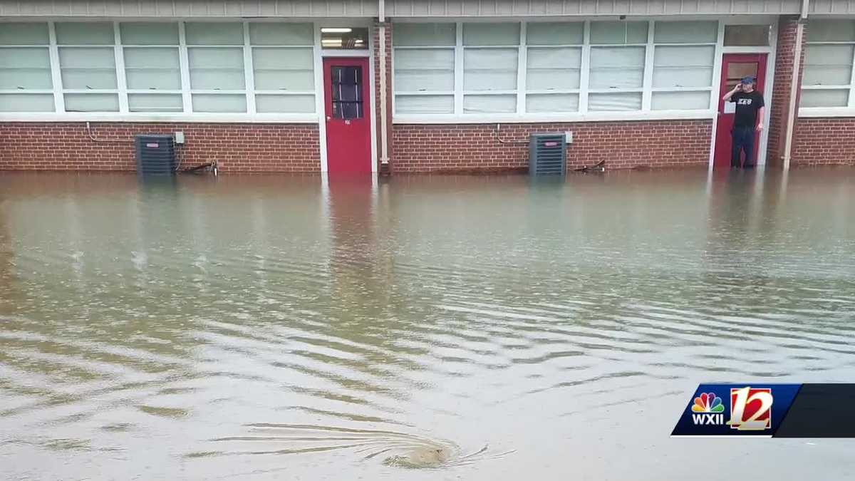 King community comes together to clean up school after flooding ...